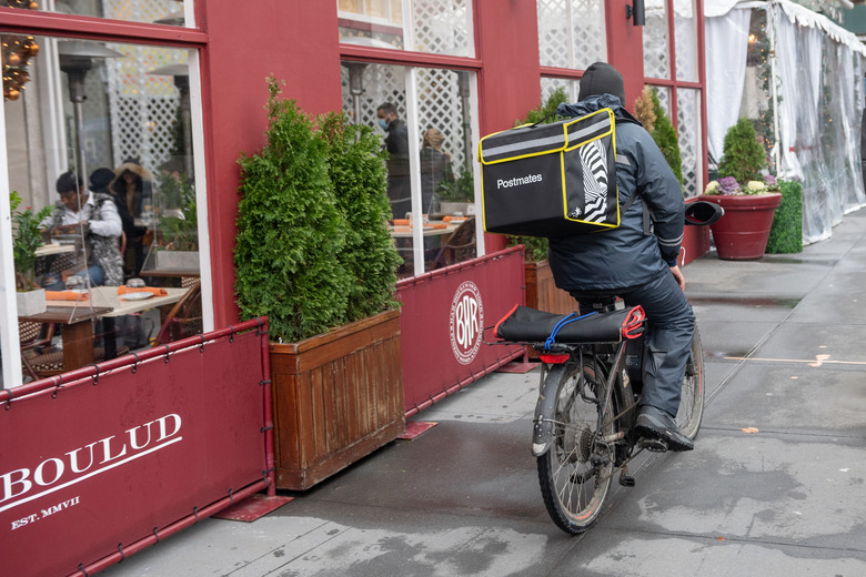 Uber cuts 15 percent of Postmates' workforce
